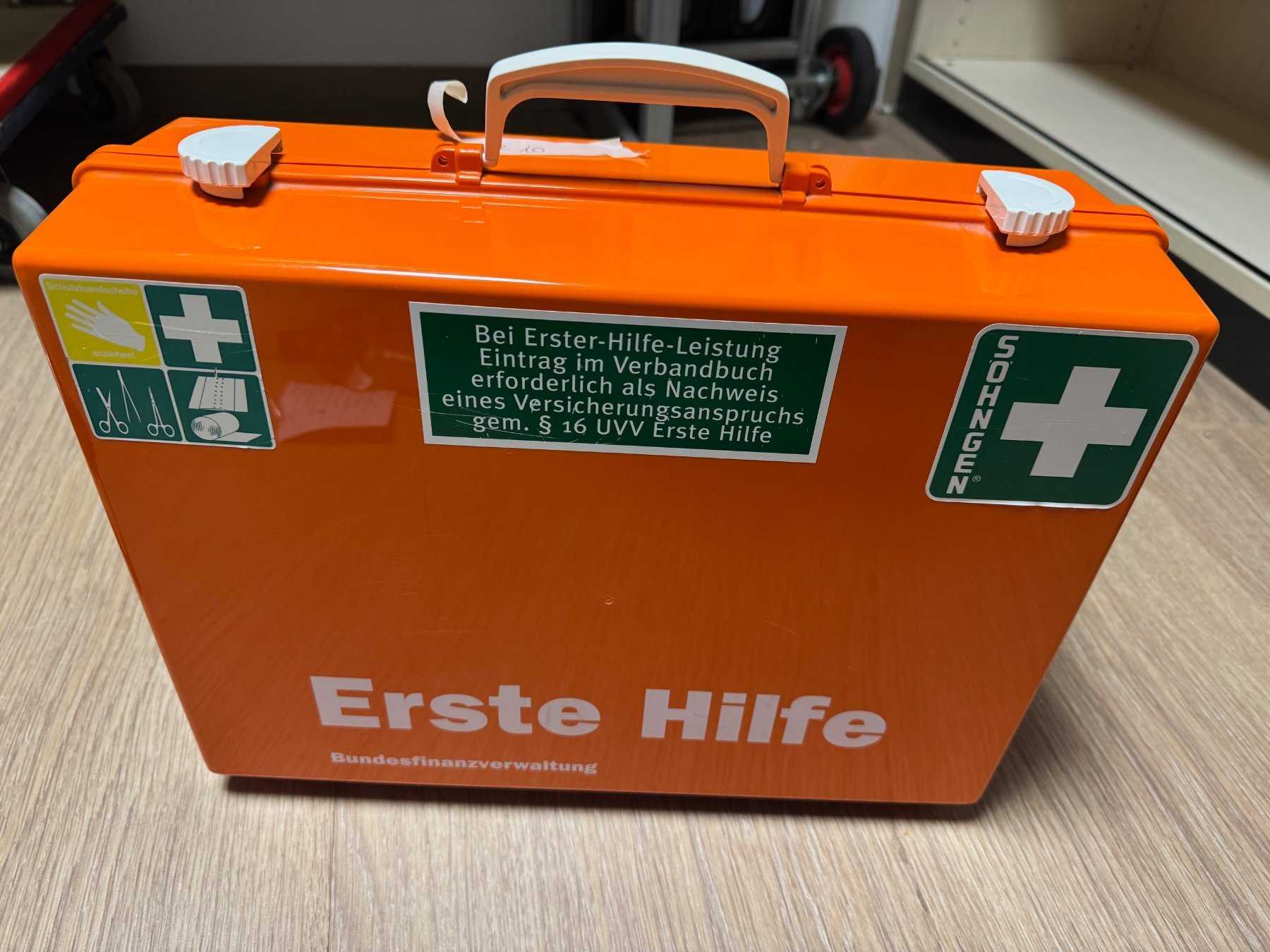 Zoll-Auktion - 1 SÖHNGEN Erste-Hilfe-Koffer in orange mit Inhalt (ID ...